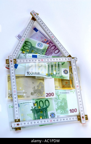 Bank notes and folding ruler Stock Photo - Alamy