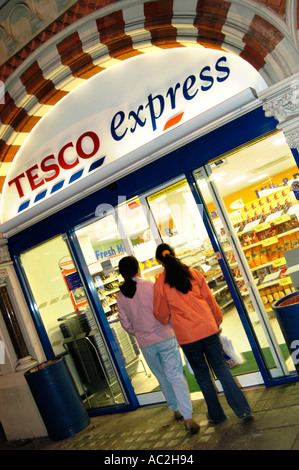 Tesco Express store at night open until late, London England UK Stock ...
