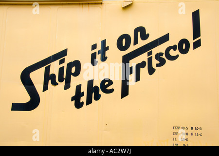 Yellow painted boxcar of railroad train Stock Photo - Alamy