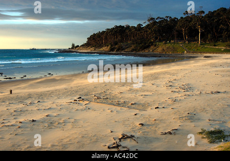 Beautiful empty rocky seashore near cliffs and stone formations with ...