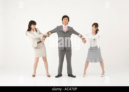 Two Women fighting over a Man Stock Photo - Alamy