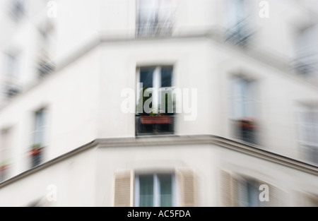 zooming in on window in building in Paris Stock Photo - Alamy