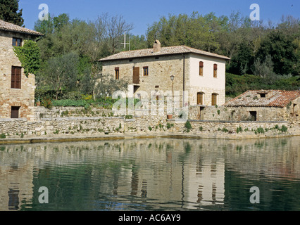 Thermal bath town of Bagno Vignoni, Italy during sunrise. Old thermal ...