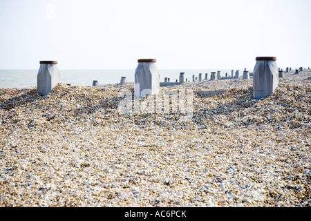 Groins coastal protection on pebble beach in North Devon UK Stock Photo ...