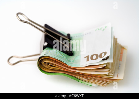 Bundle of Euro notes held together by clip Stock Photo - Alamy
