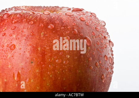 A red apple with waterdrops isolated on white background Stock Photo ...