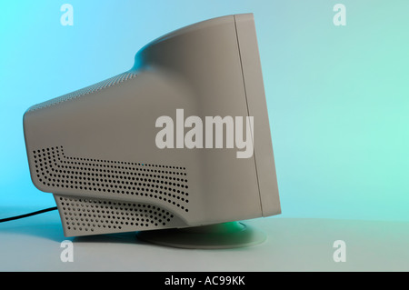 CRT computer monitor display side view close-up isolated on blue Stock ...