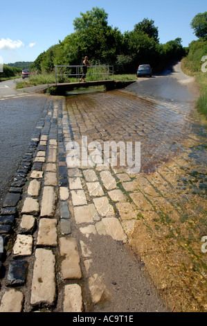 A ford river crossing at a road in the Piddlevalley in Dorset England ...