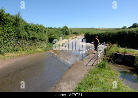 A ford river crossing at a road in the Piddlevalley in Dorset England ...