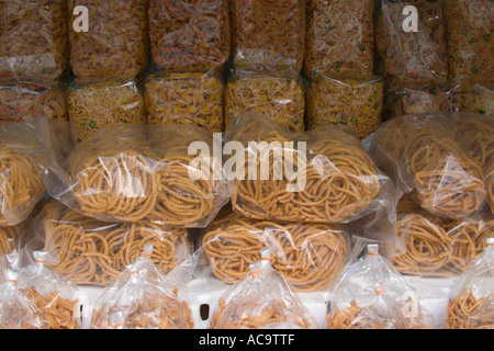 packets of indian crunchy snacks on sale Stock Photo - Alamy