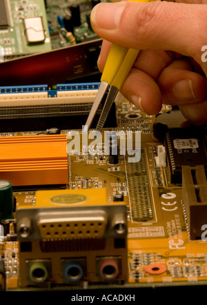 Computer hardware repair and fixing concept by experienced technician ...
