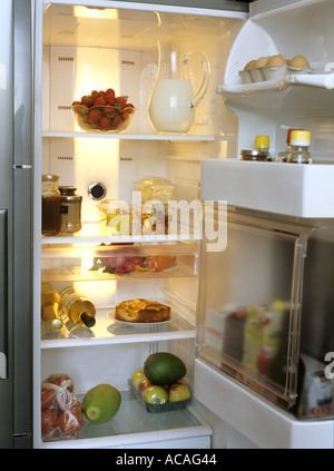 open refrigerator filled with various fresh food Stock Photo - Alamy