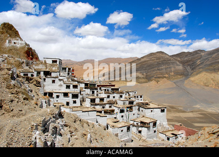 Mountain and monastery Shegar with white washed walls situated at the ...
