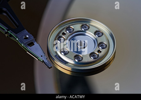 Macro-photo of HDD read-write head and armature. Spindle motor in ...