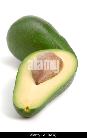 Two Avocados one halved Stock Photo - Alamy