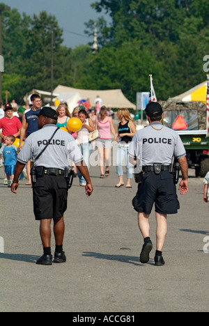 Police provide security at a carnival festival Stock Photo - Alamy