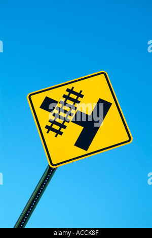 Traffic sign warning motorist of a railroad train track on a connecting ...
