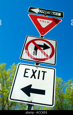 Confusing traffic sign with 'one way' pointing in two directions Stock ...