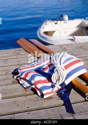Oars and a rope Stock Photo - Alamy