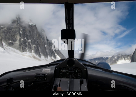 View from the cockpit of a bush plane flying over the Pika Glacier ...