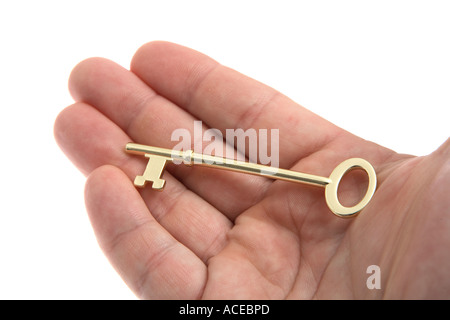 hand holding skeleton key Stock Photo - Alamy