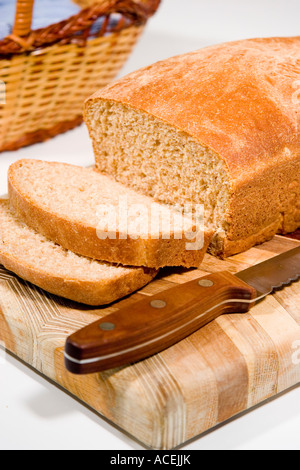 Put a slice of bread in the basket for eating Stock Photo - Alamy