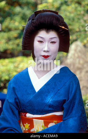 Portrait of a Japanese woman, geisha posing for a picture, Gion area ...