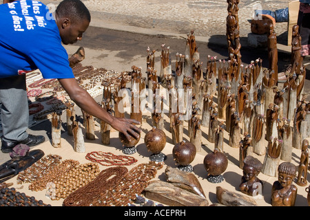 Maputo craft market selling wooden beer bottle as tourists souvenirs ...