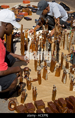 Maputo craft market selling wooden beer bottle as tourists souvenirs ...