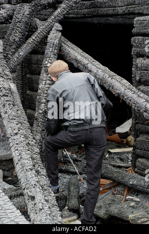 Charred beams of burned down log cabin , Finland Stock Photo - Alamy
