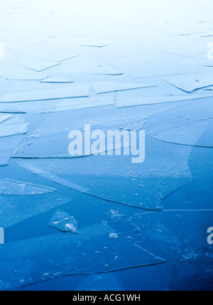 Cracked ice on water Stock Photo - Alamy