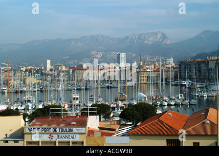 Port of Toulon marina with mountains beyond Stock Photo - Alamy