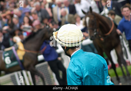 Parade ring with jockeys owners and trainers at Chepstow Racecourse ...