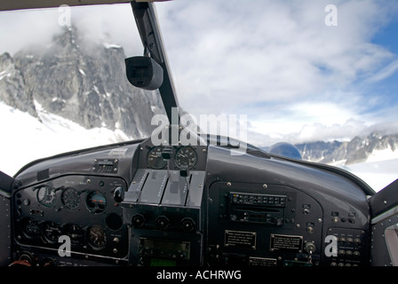 View from the cockpit of a bush plane flying over the Pika Glacier ...