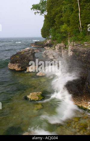 Waves crashing the shoreline of door county Wisconsin Stock Photo - Alamy