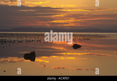Sunrise across Luce Bay Stock Photo - Alamy