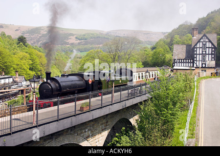 Train at Berwyn Station with a view of the River Dee and the chain ...