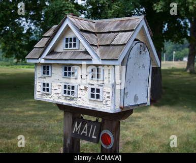 Mailbox in the shape of a small house Stock Photo - Alamy