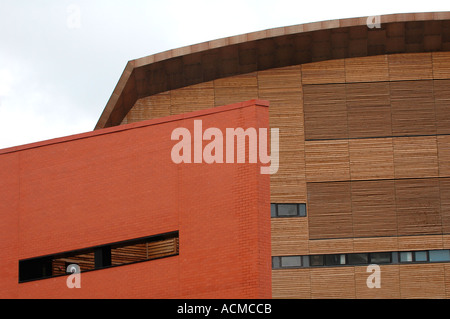 cladding of red brick house facade with corrugated sheet metal Stock ...