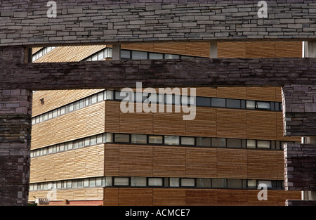 Welsh slate wall with timber cladding and stainless steel roof exterior ...