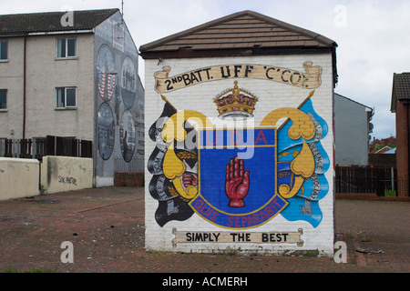 Mural with UDA emblem and UDA and UFF flags Shankill Road Belfast ...