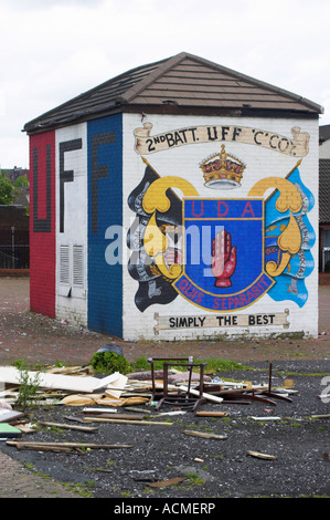 Mural with UDA emblem and UDA and UFF flags Shankill Road Belfast ...