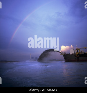 A dredger pumping for land reclamation in the Gulf off Dubai Stock ...