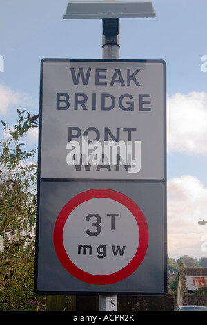 Welsh road sign, weak bridge 1 and a quarter miles ahead Stock Photo ...