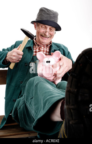 Man breaking piggy bank with hammer on white background, closeup Stock ...