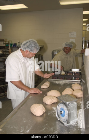 Inmate working in the kitchen. Correctional Officer supervising ...