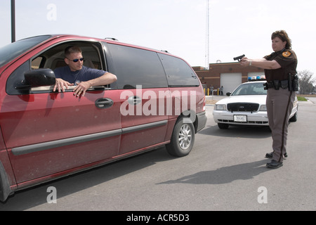 Felony traffic stop. Female deputy sheriff stopping motorist (training ...