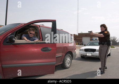 Felony traffic stop. Female deputy sheriff stopping motorist (training ...