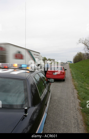 Police officer conducting a traffic stop outside the terminal Stock ...