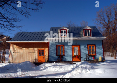 Blue house Winter Monteregie area Quebec canada Stock Photo - Alamy